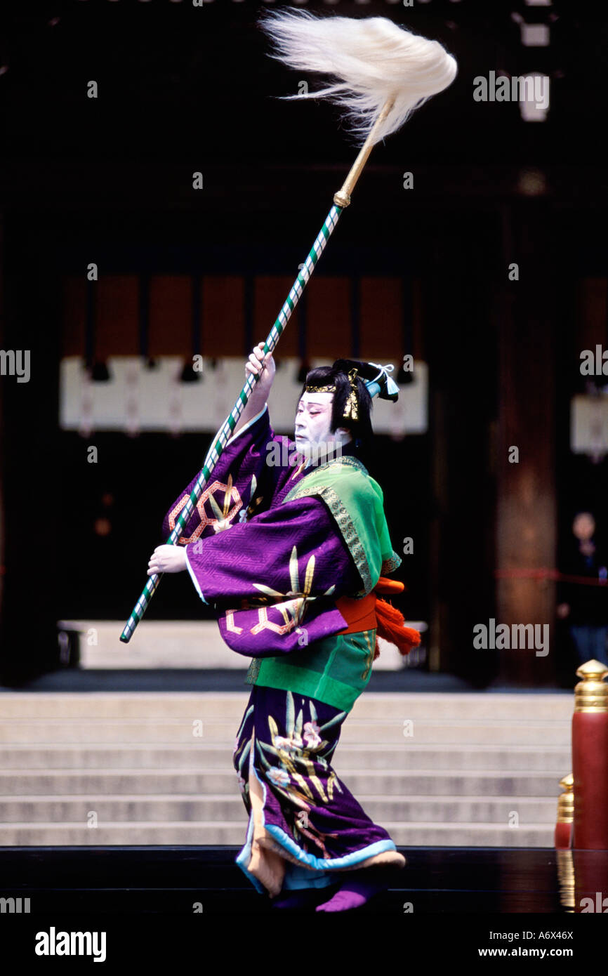 A Japanese dancer performs a traditional dance at a ceremony in the ...