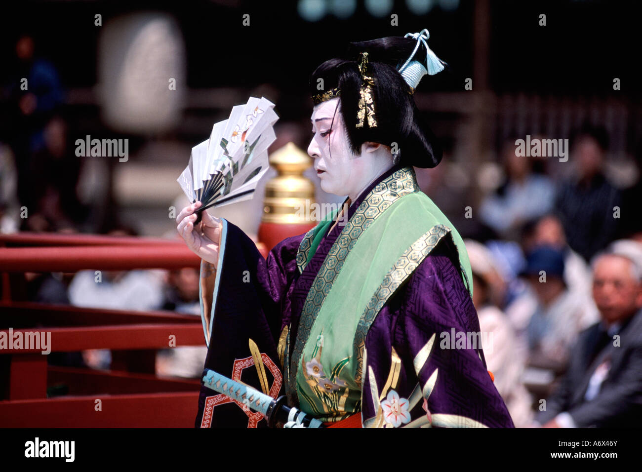 A Japanese dancer performs a traditional dance at a ceremony in the ...