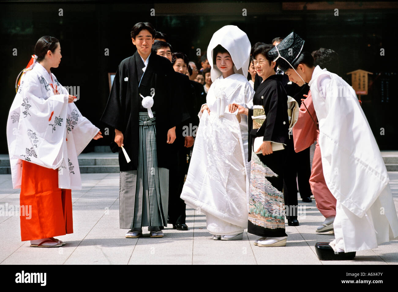 A traditional Japanese wedding procession at the Meiji Shrine in Tokyo ...