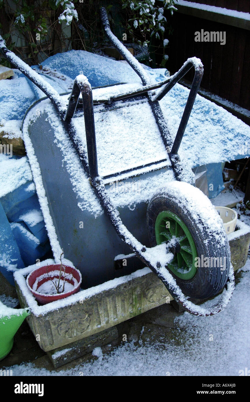Snow wheelbarrow hi-res stock photography and images - Alamy