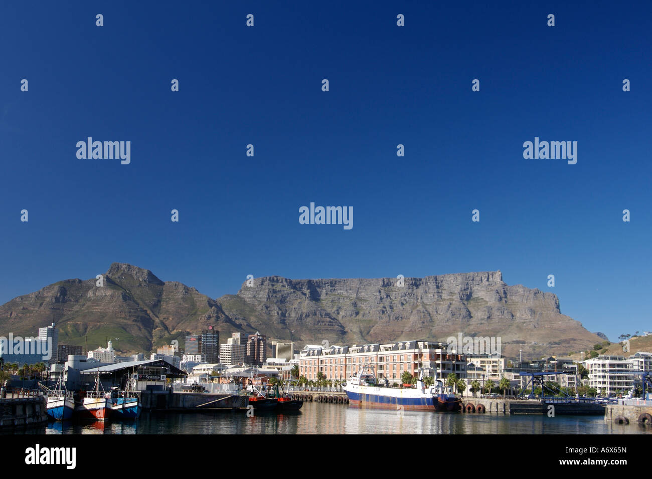 View of Table Mountain, Devil's Peak and the waterfront in Cape Town ...