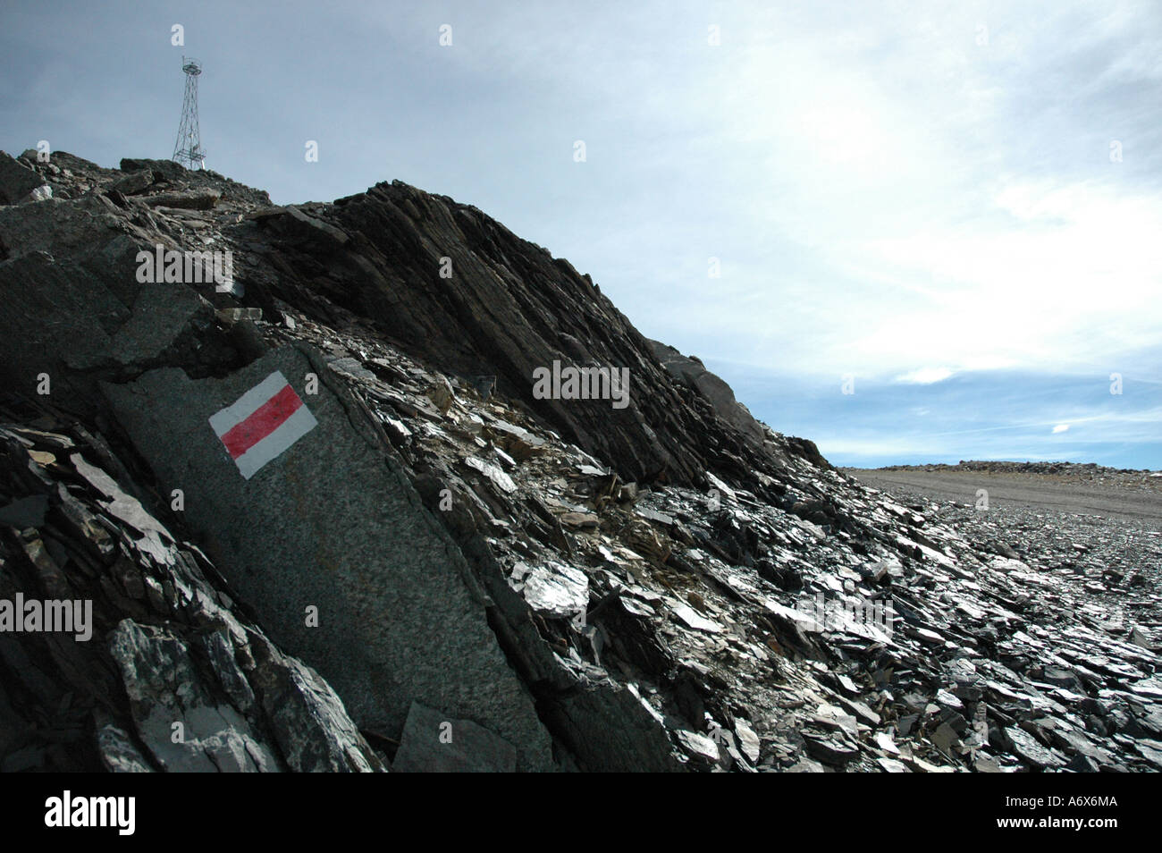 Radio transmission antenna on the top of a hill in the Swiss Alps ...