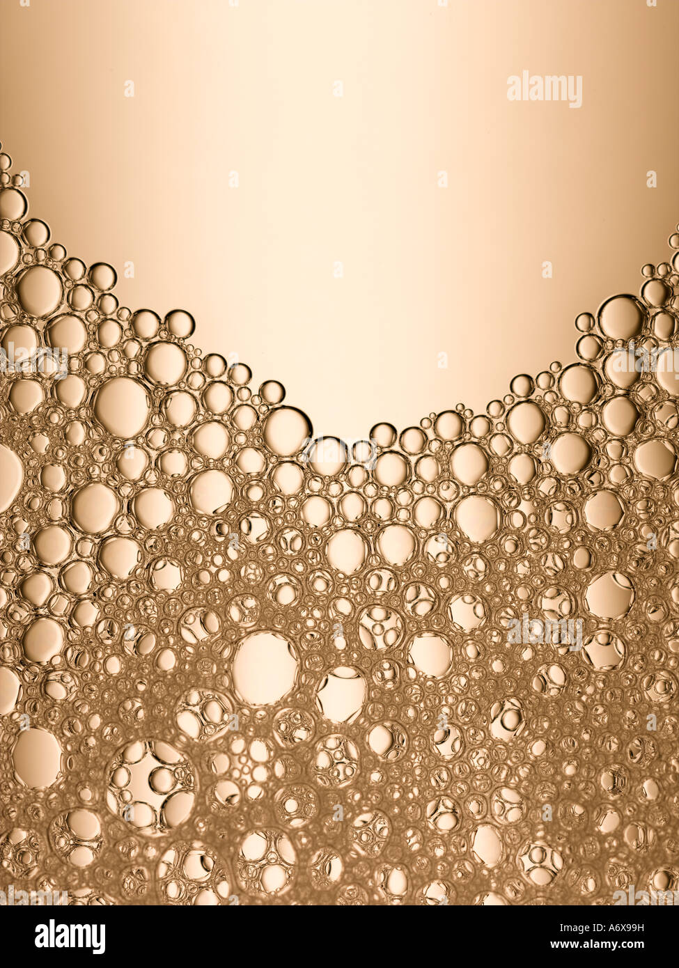 A close up of some golden bubbles Stock Photo - Alamy