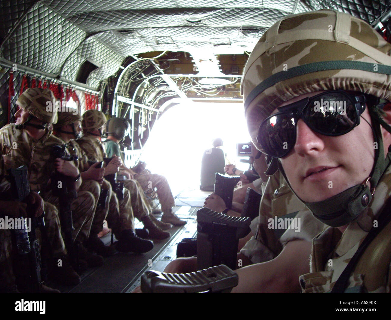 British soldier on board a Chinook helicopter in Afghanistan Stock ...