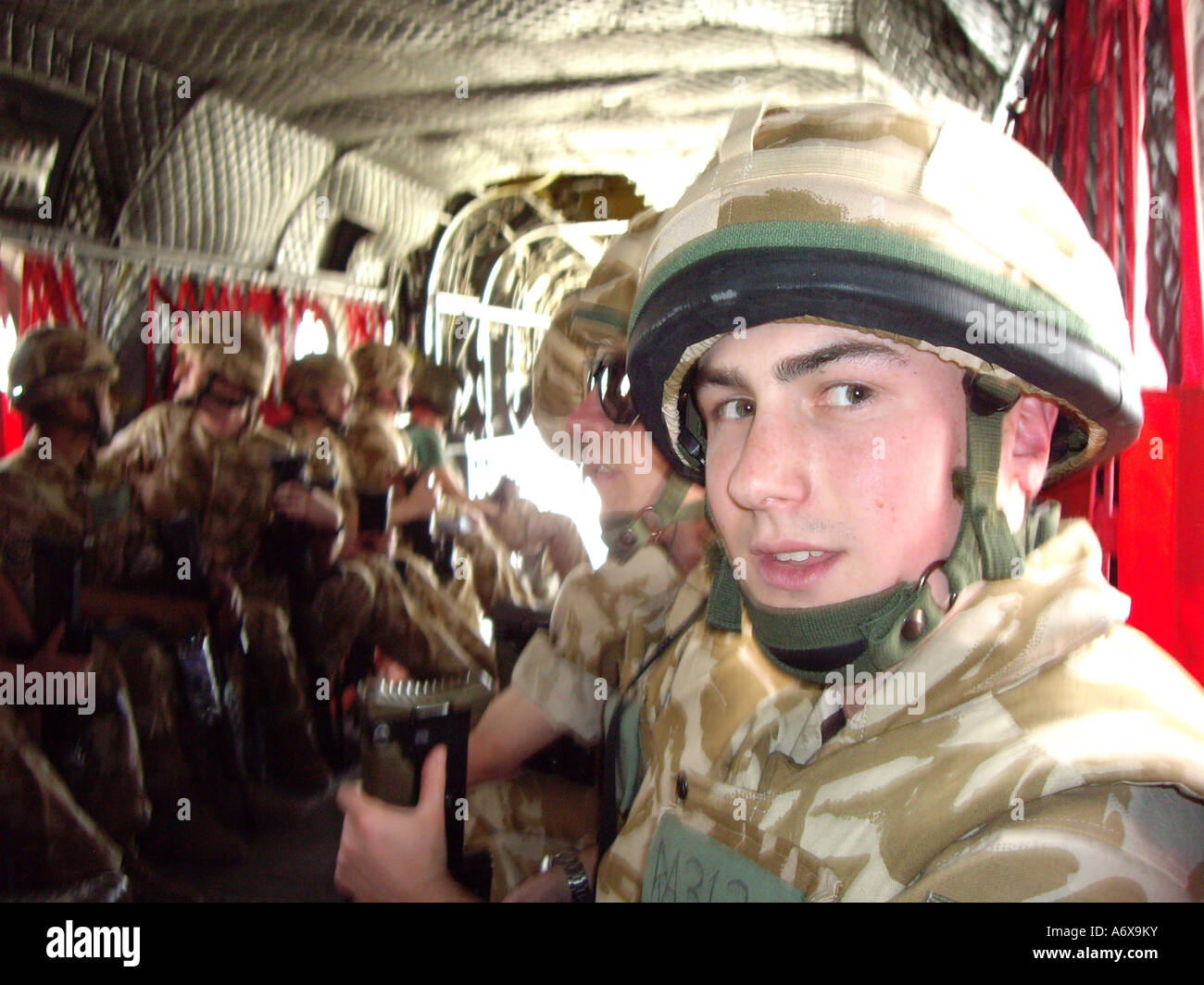 British soldier on board a Chinook helicopter in Afghanistan Stock ...