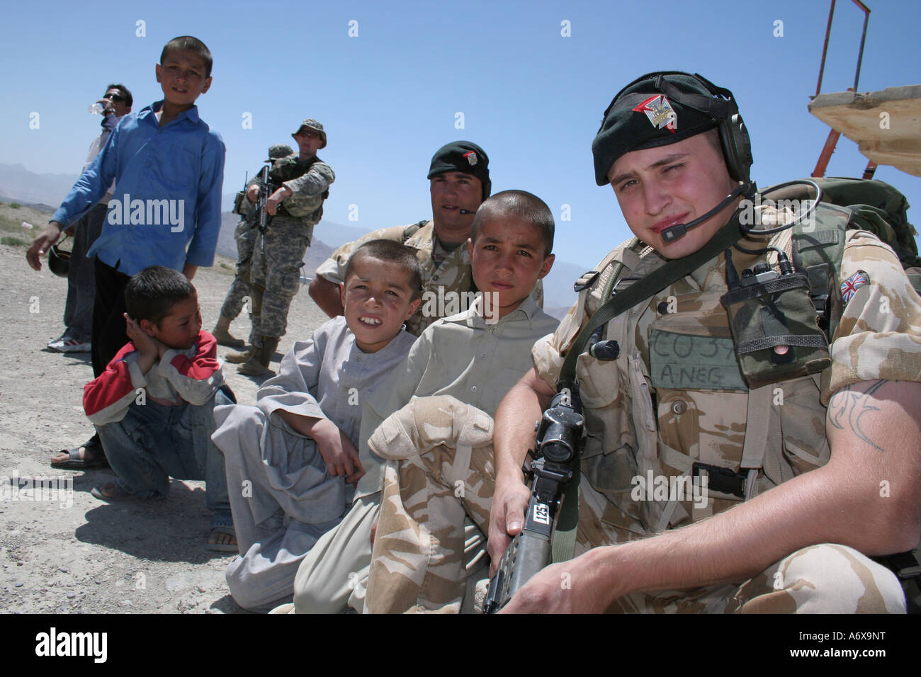 A British Army foot patrol with Afghan children, Kabul Stock Photo - Alamy