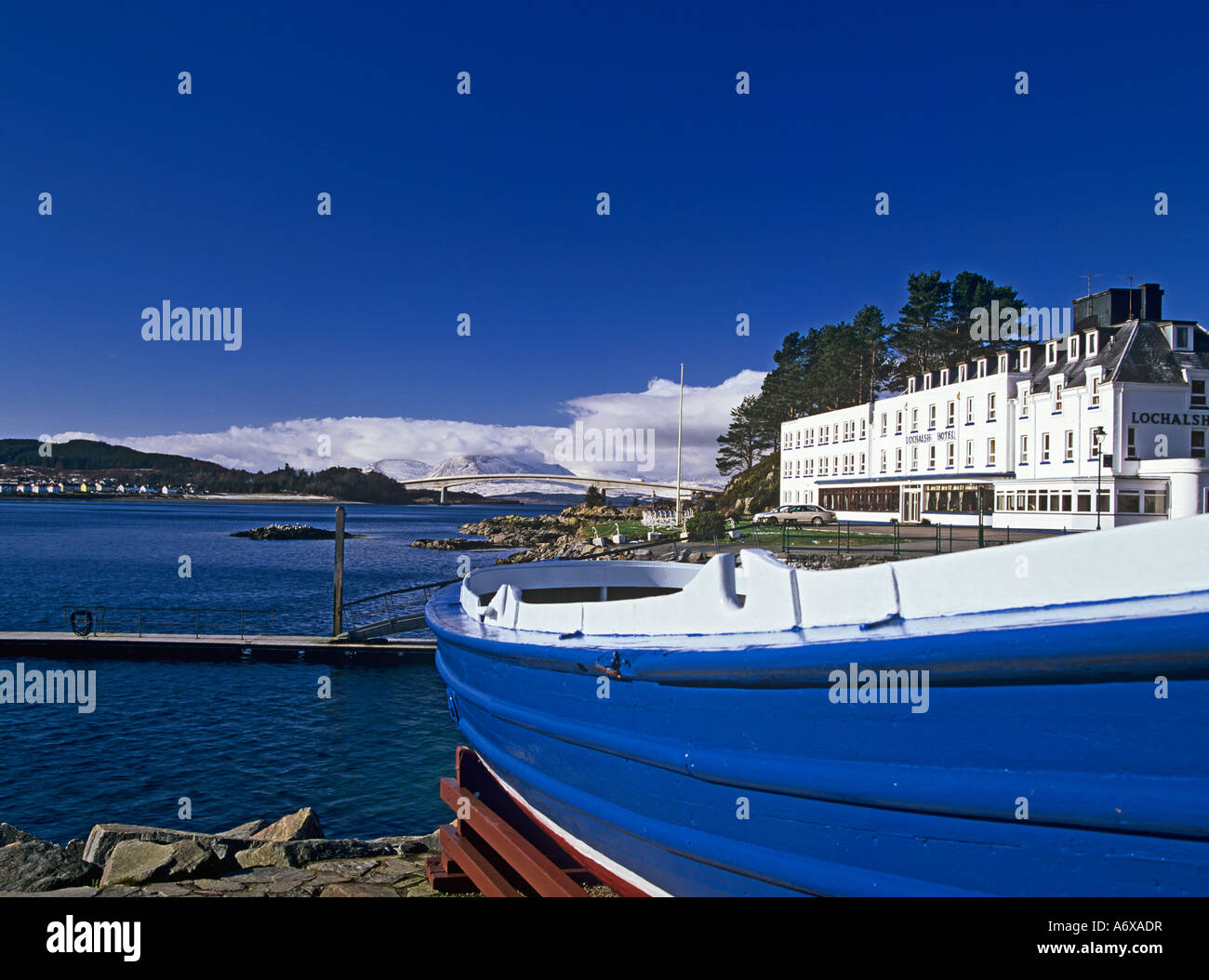 KYLE OF LOCHALSH SCOTTISH HIGHLANDS UK February A blue boat beached in ...