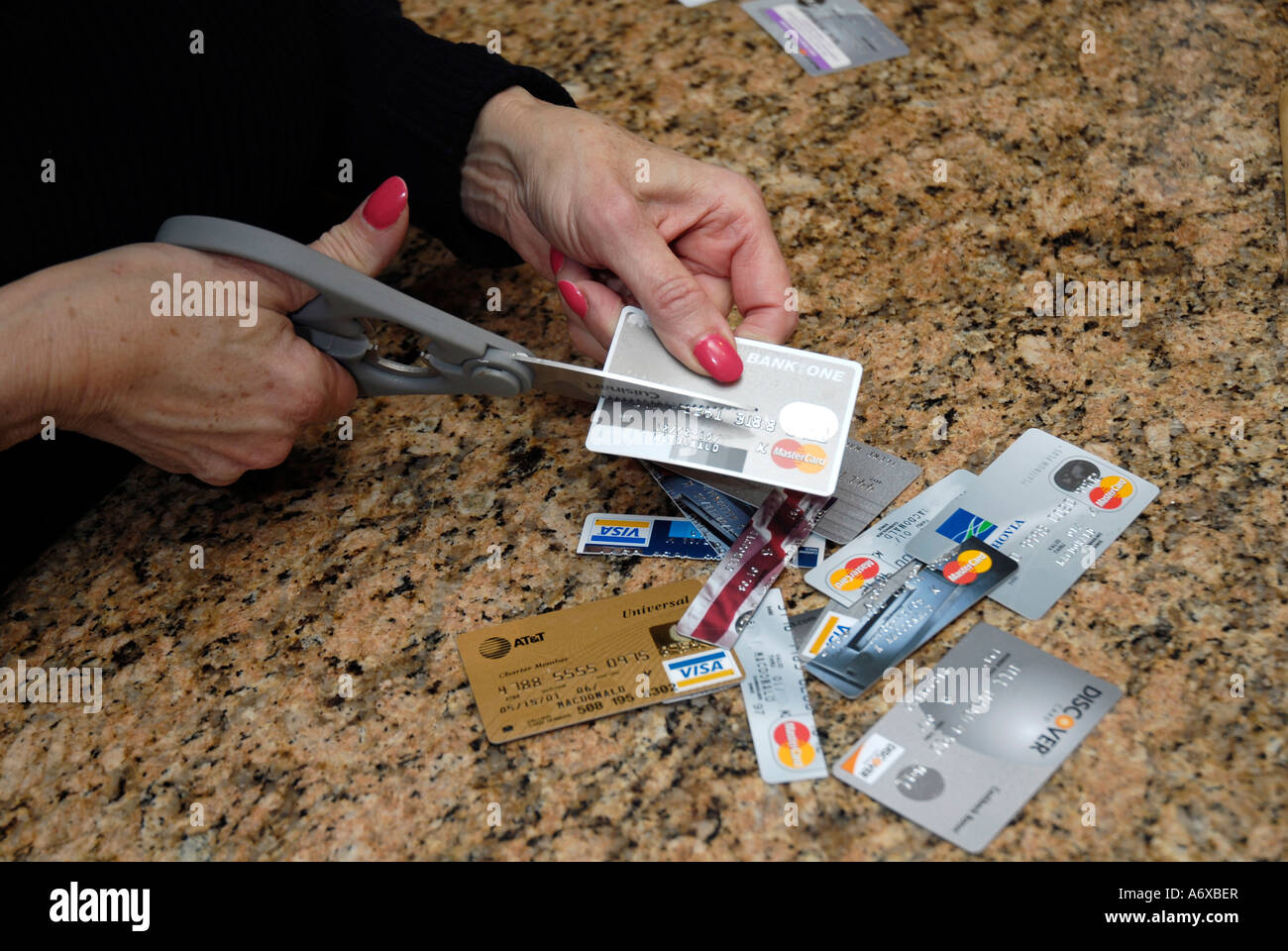 Cutting up credit cards hi-res stock photography and images - Alamy