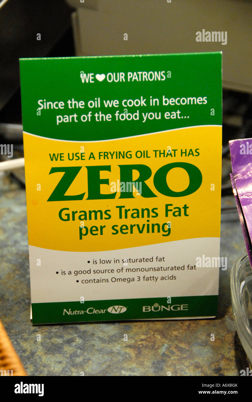 Sign on the counter of a restaurant informing patrons that they use ...