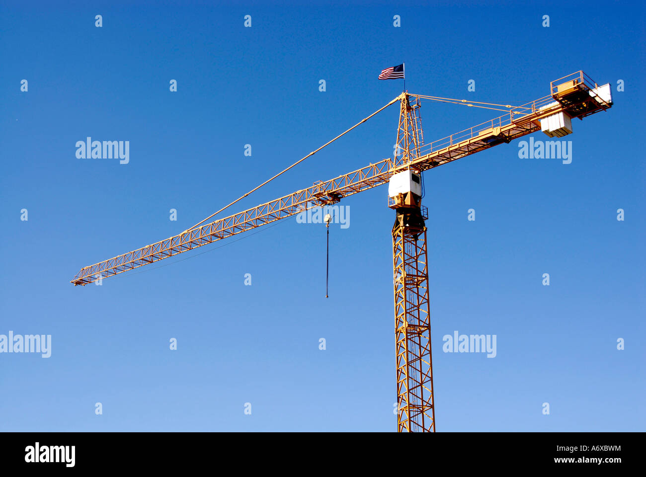 Large crane used to build tall buildings Stock Photo - Alamy