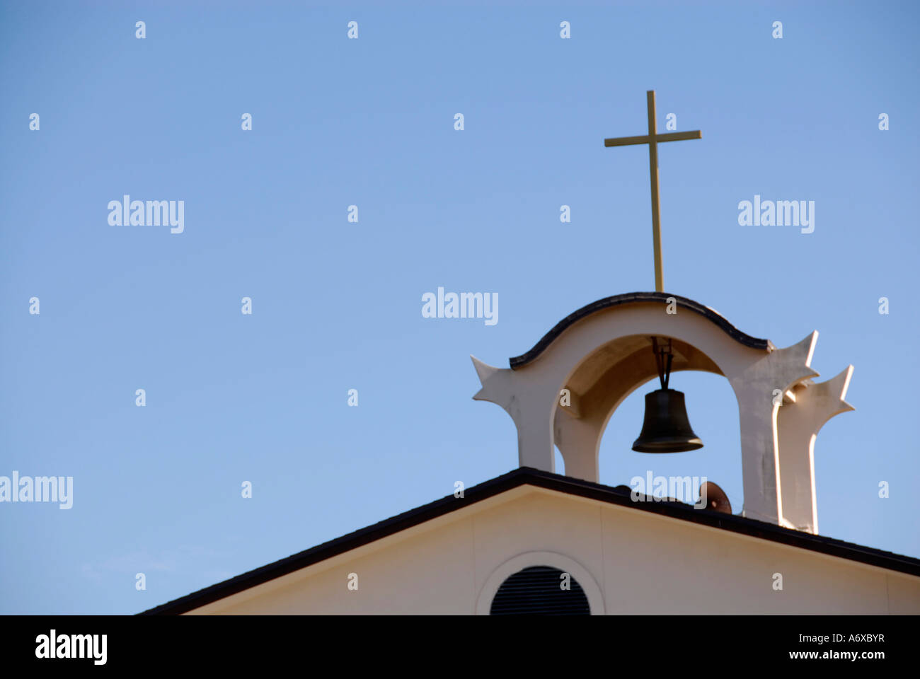 Church cross and bell Stock Photo - Alamy