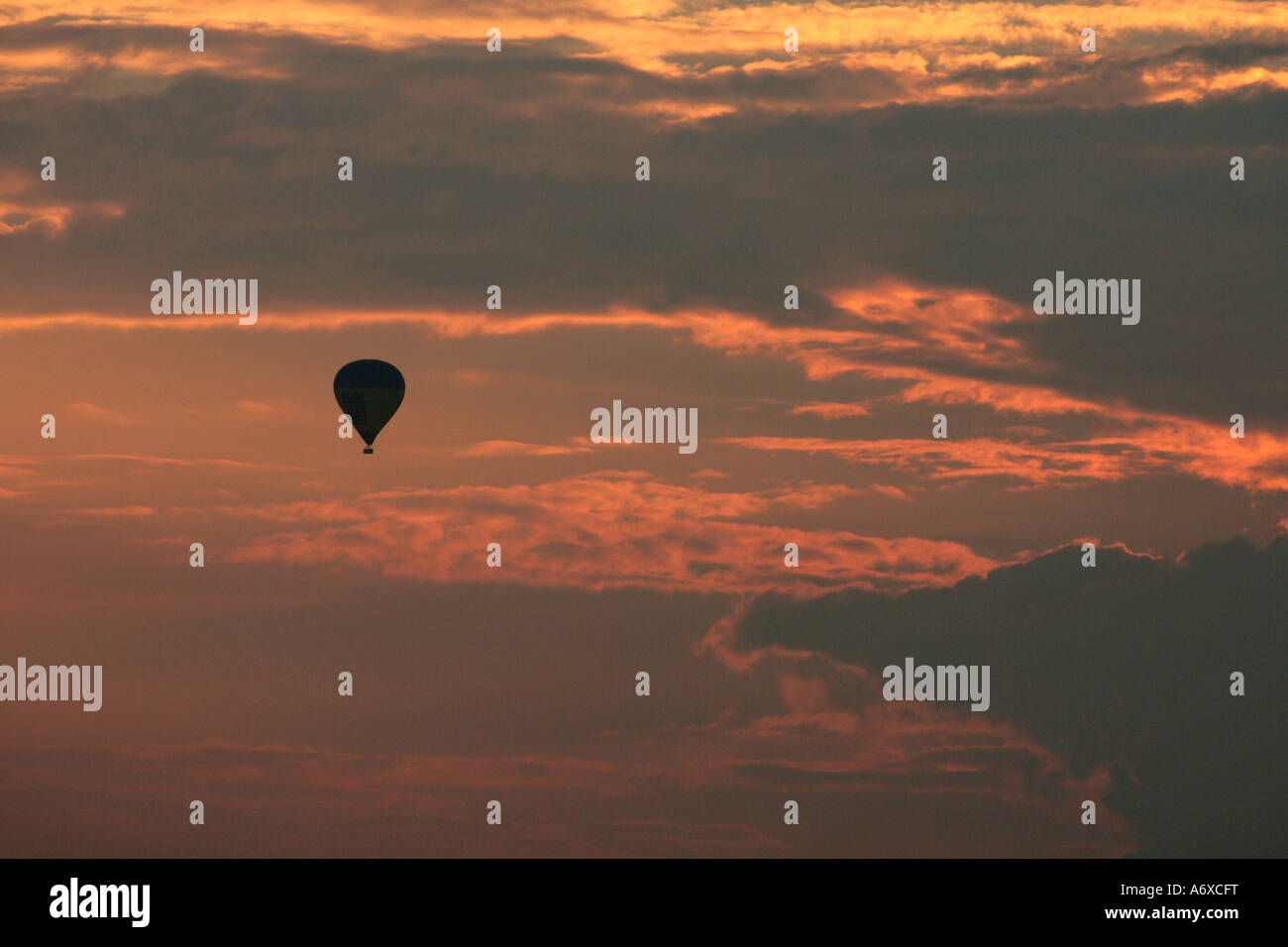 Hot air balloon at sunset Stock Photo - Alamy