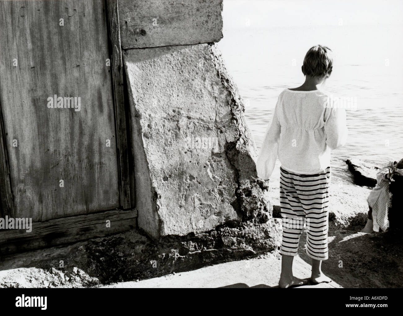 Young girl looking out to sea Key West Florida USA Stock Photo - Alamy