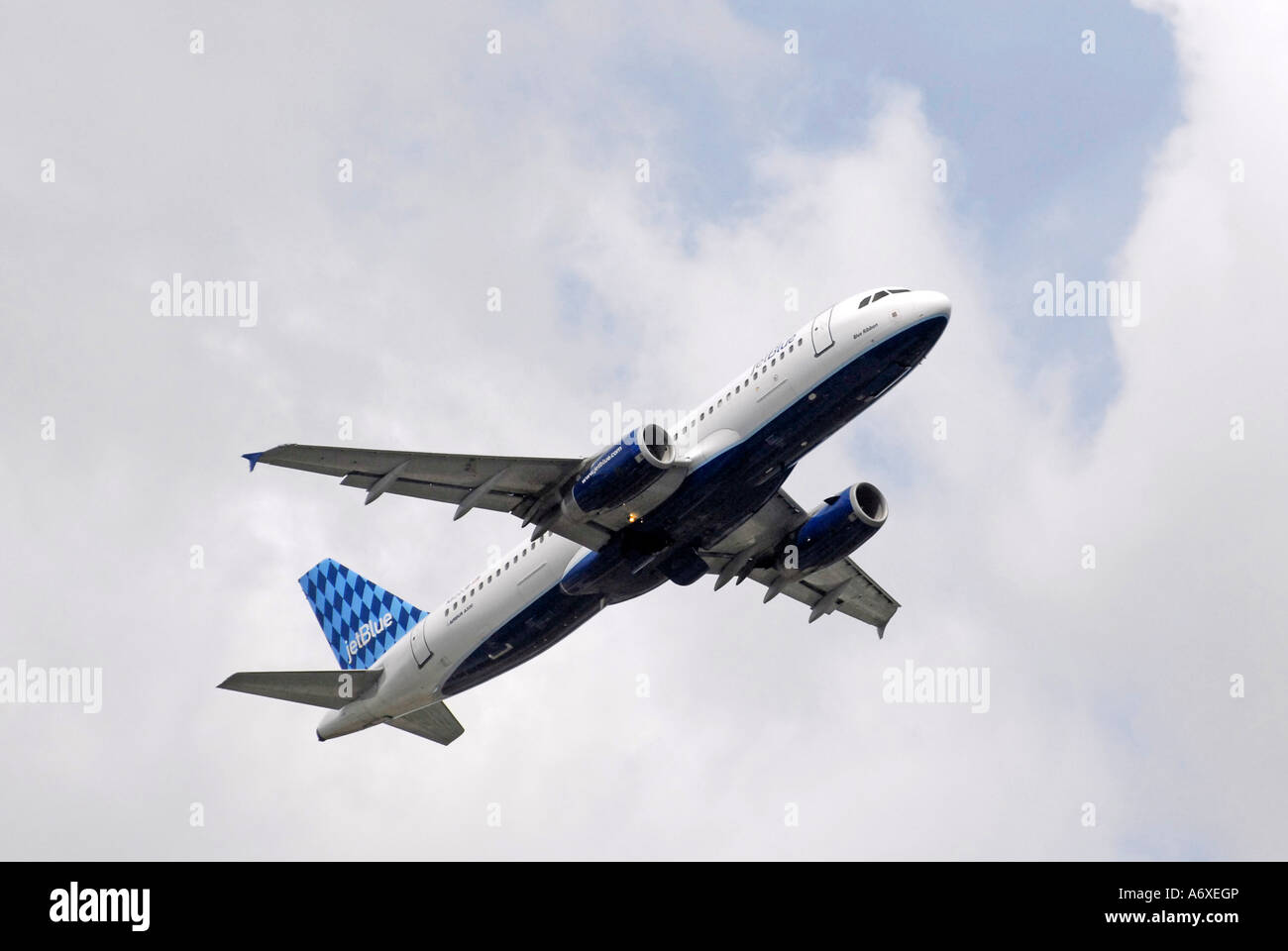 Passenger jet blue aircraft fly in and out of Sarasota Florida FL Fla ...