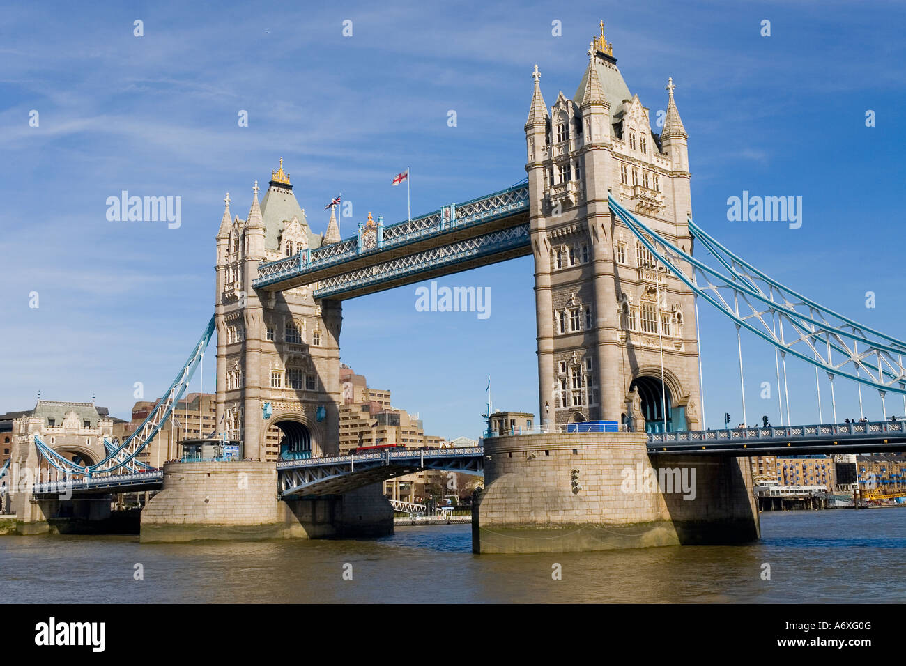 The world famous Tower Bridge spans the River Thames in London, England ...