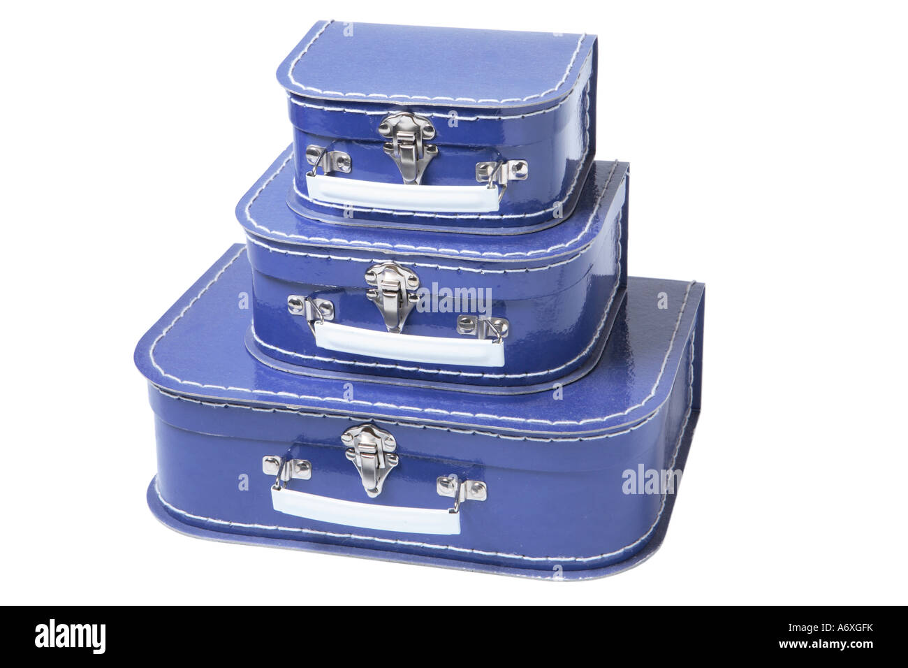 Stack of three blue cases cut out on white background Stock Photo - Alamy