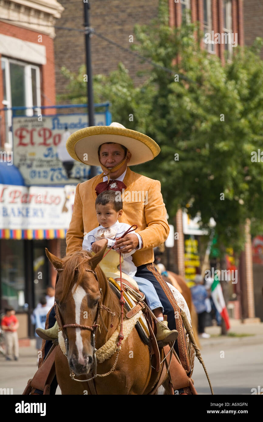 ILLINOIS Chicago Man and boy on horseback traditional costume Mexican ...
