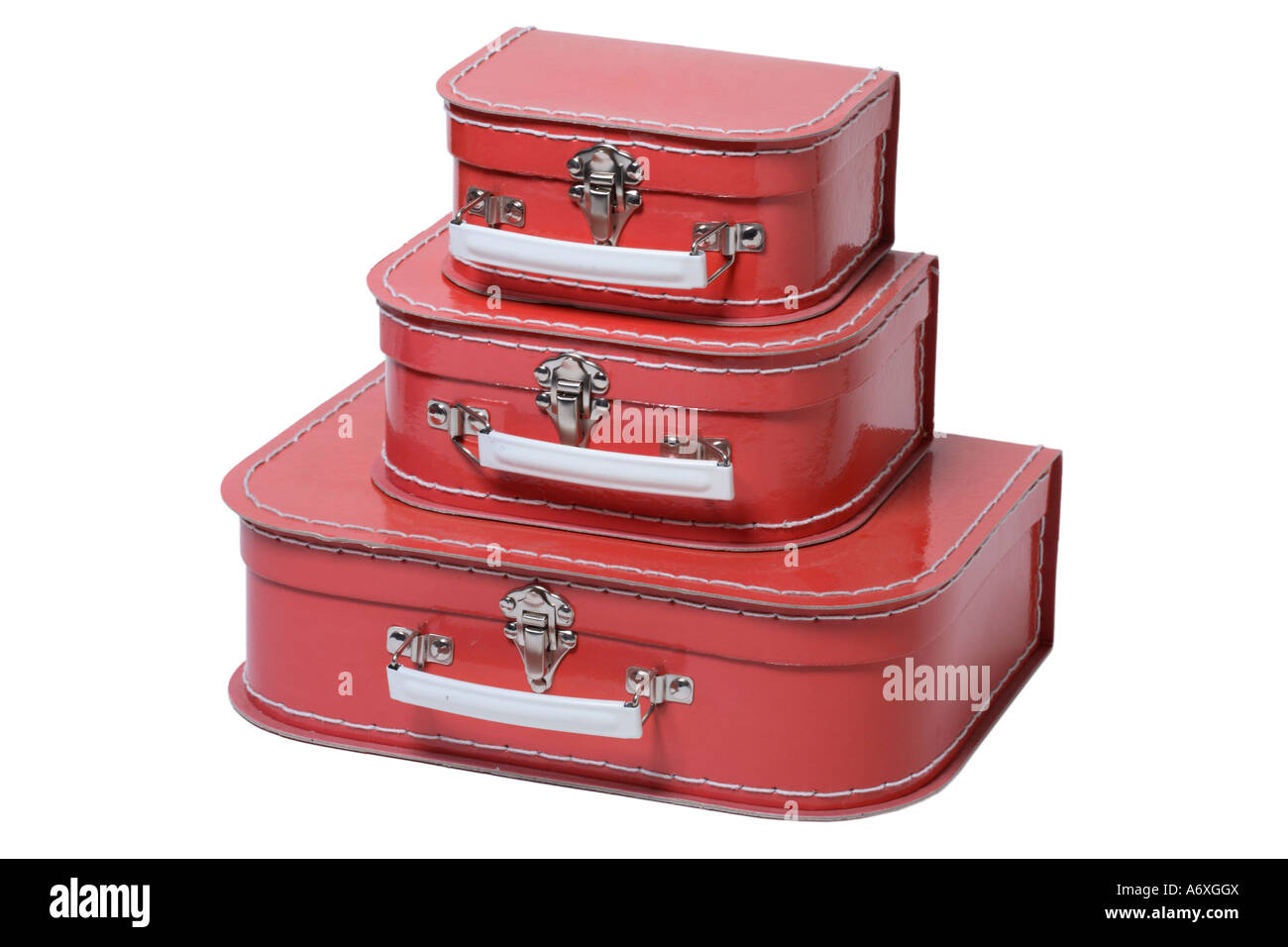 Stack of red suitcases cut out on white background Stock Photo - Alamy