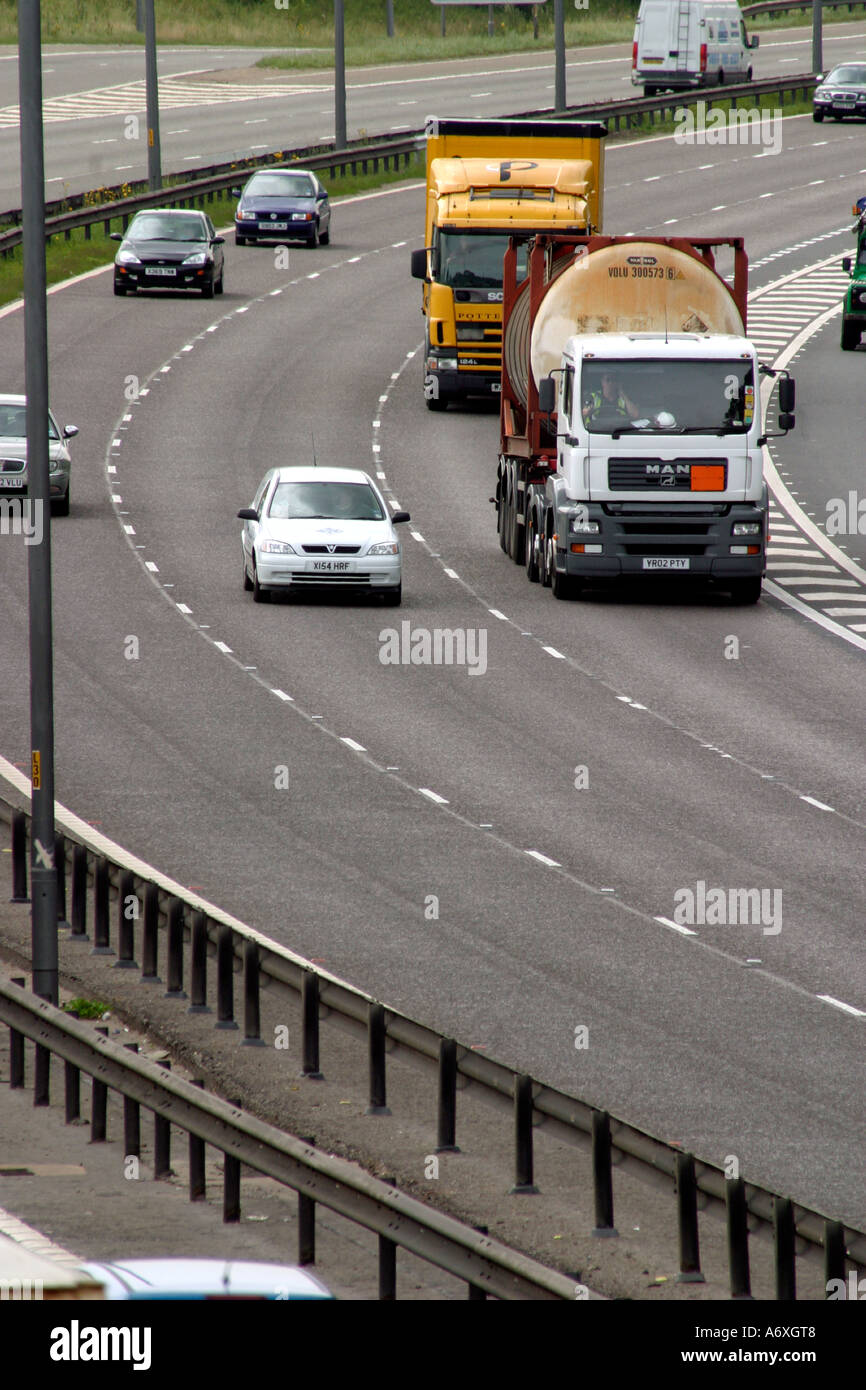 M62 towards Junction 25 from motorway bridge with moderate traffic flow ...