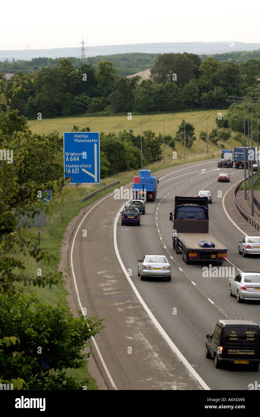 M62 towards Junction 25 from motorway bridge with moderate traffic flow ...