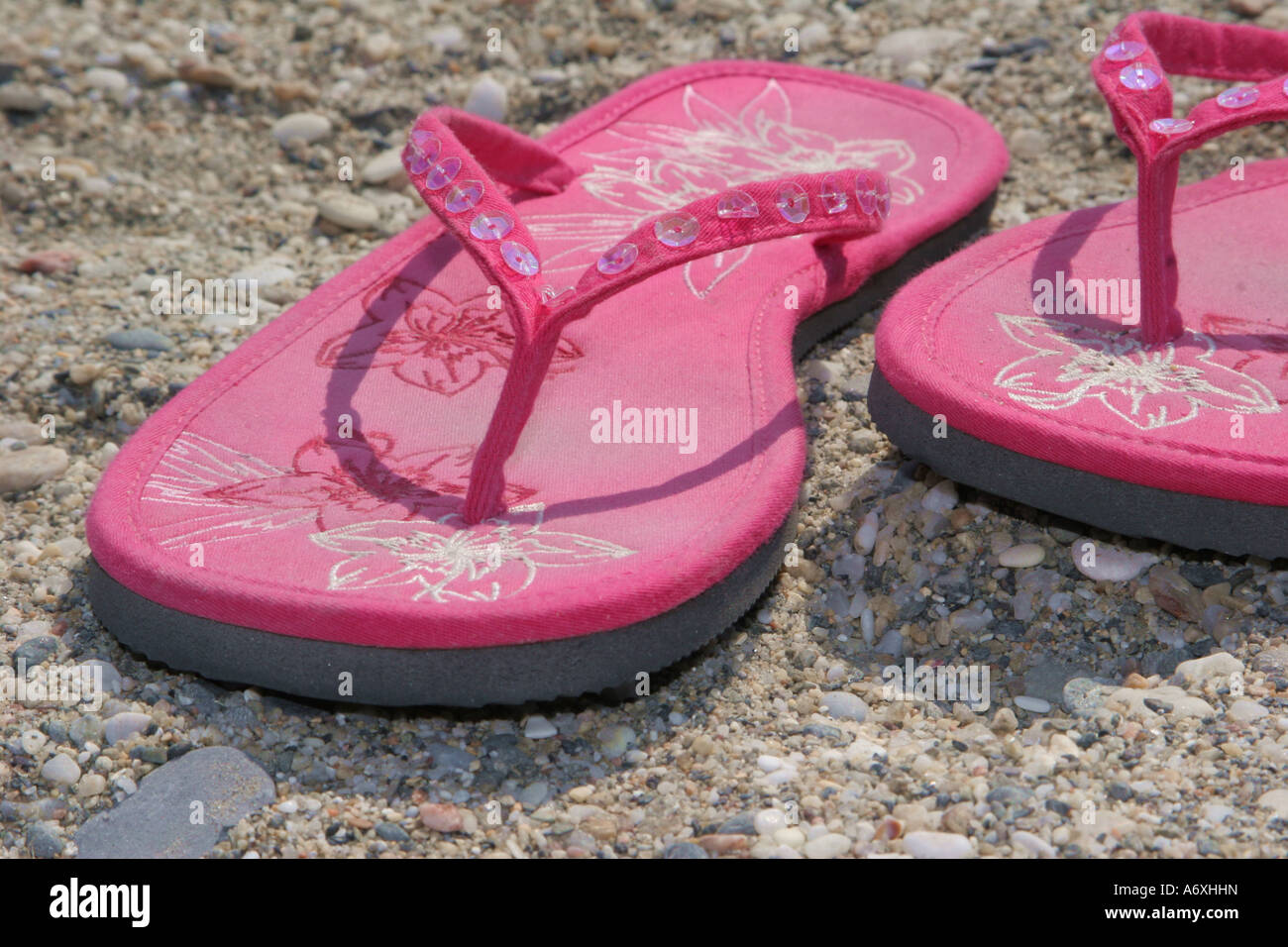 flip-flops on beach Stock Photo - Alamy