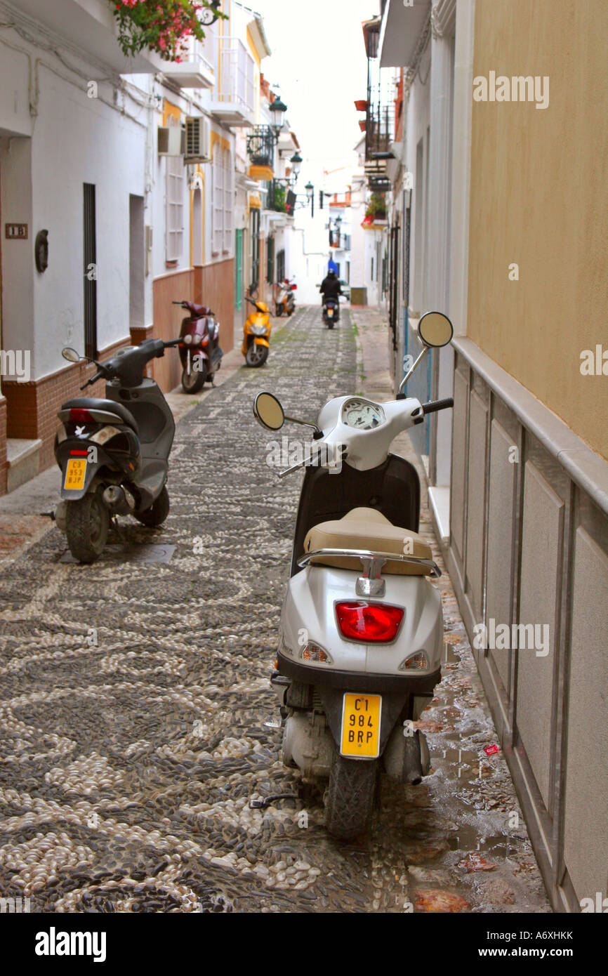 moped parked in Spanish sidestreet Stock Photo - Alamy