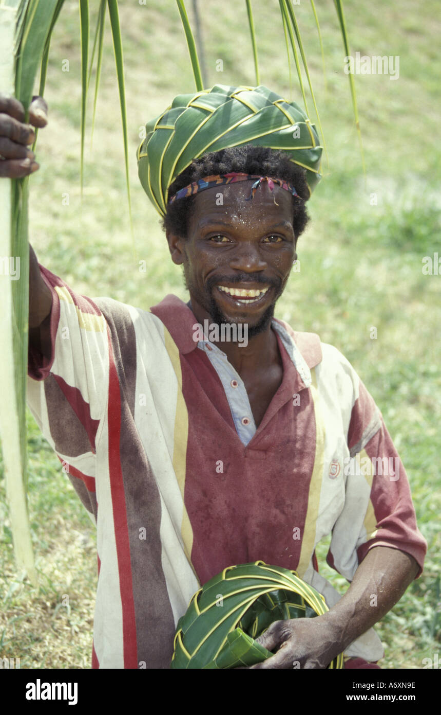 Caribbean straw hat man Stock Photo - Alamy