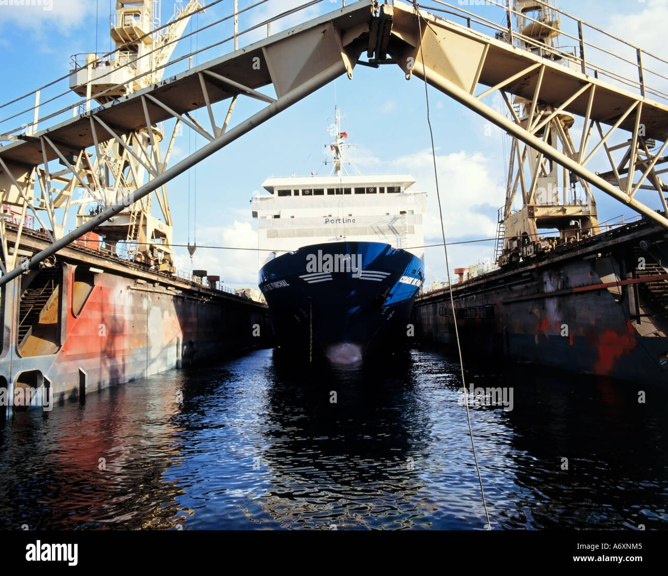 Ship being floated in a floating drydock Stock Photo - Alamy