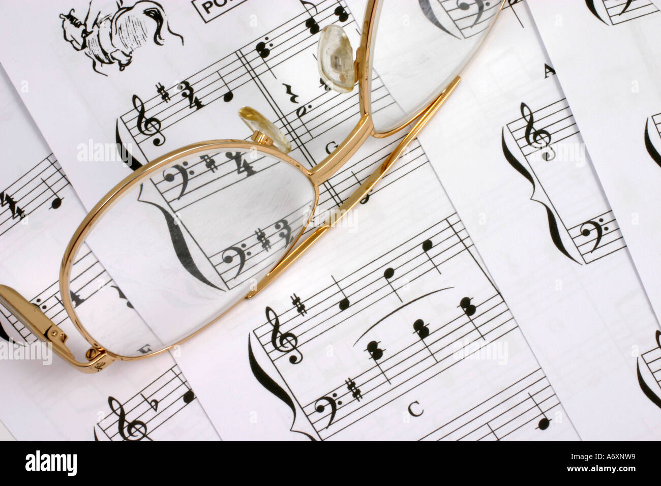 Music sheets and pair of glasses Stock Photo - Alamy