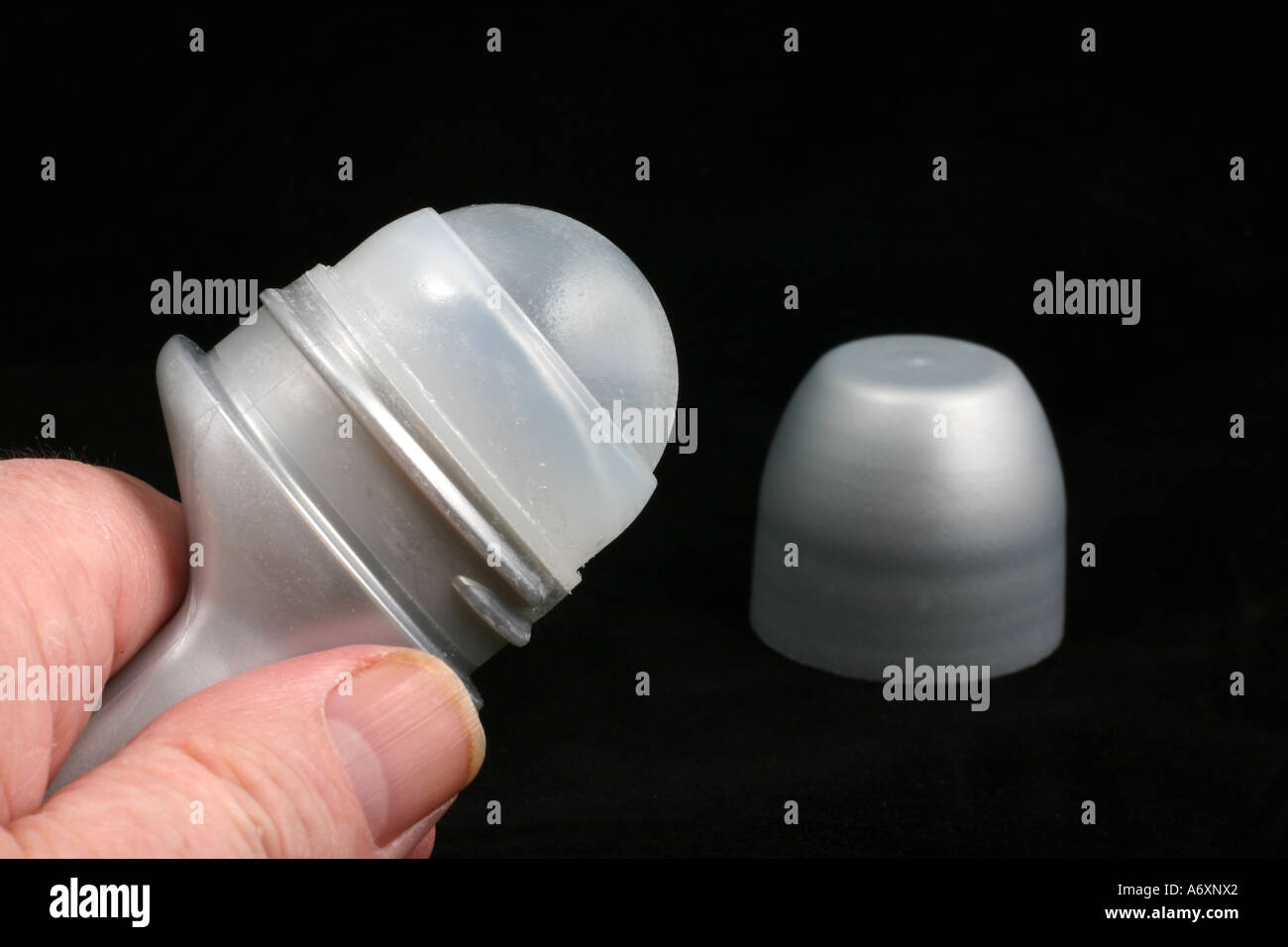 Roll on deodorant with cap Stock Photo - Alamy