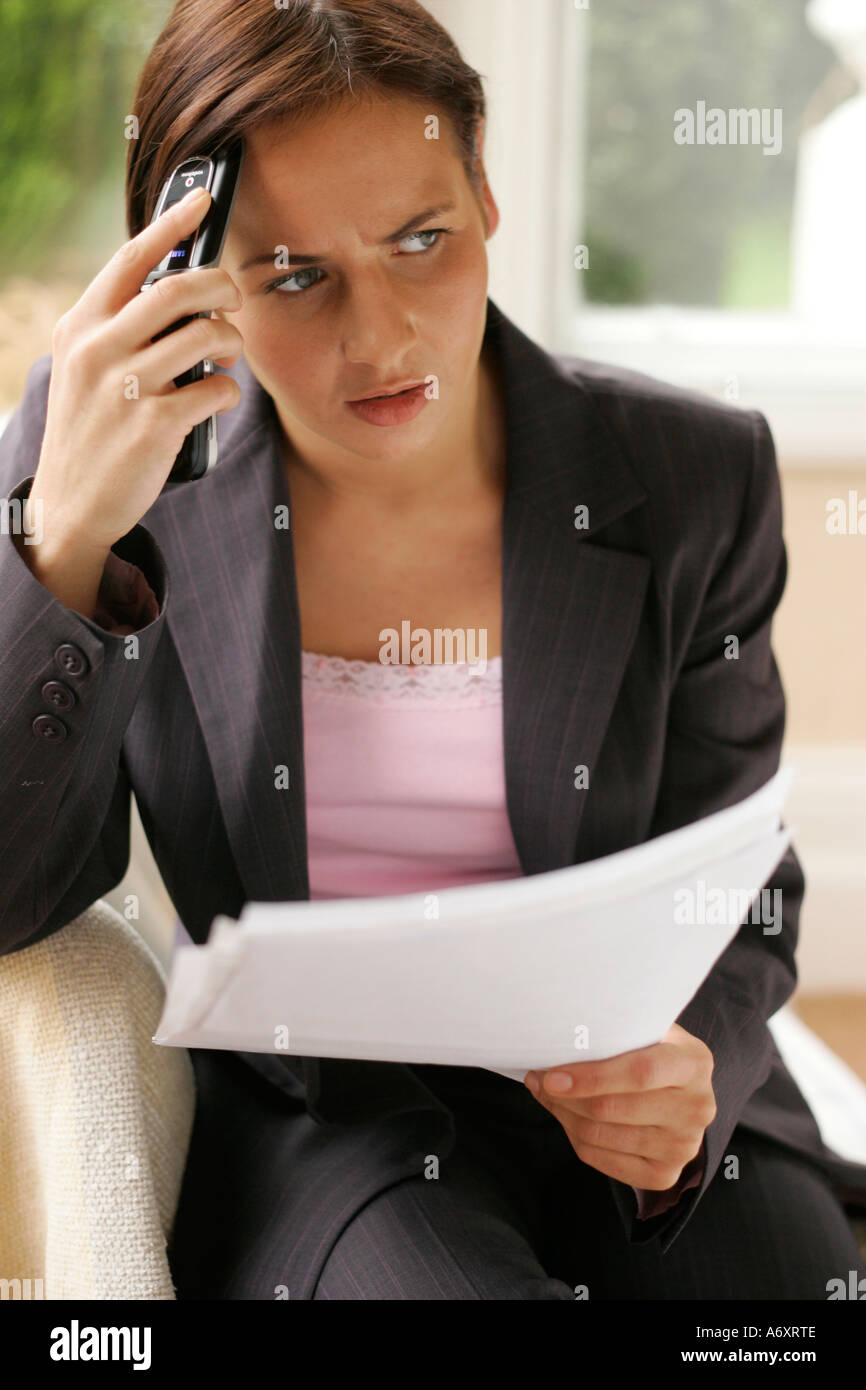 Woman complaining on the phone Stock Photo - Alamy