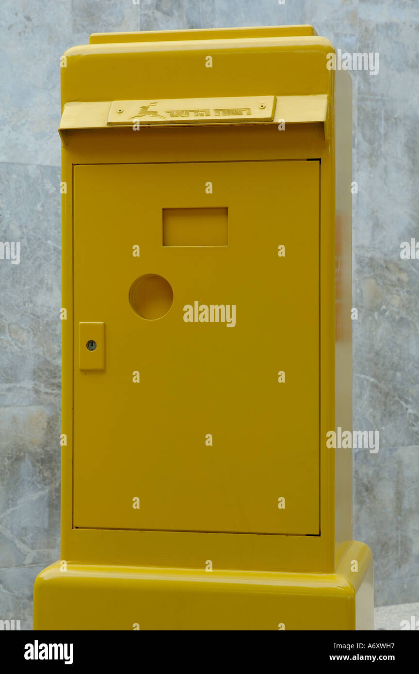 An old yellow post box Israel Stock Photo - Alamy