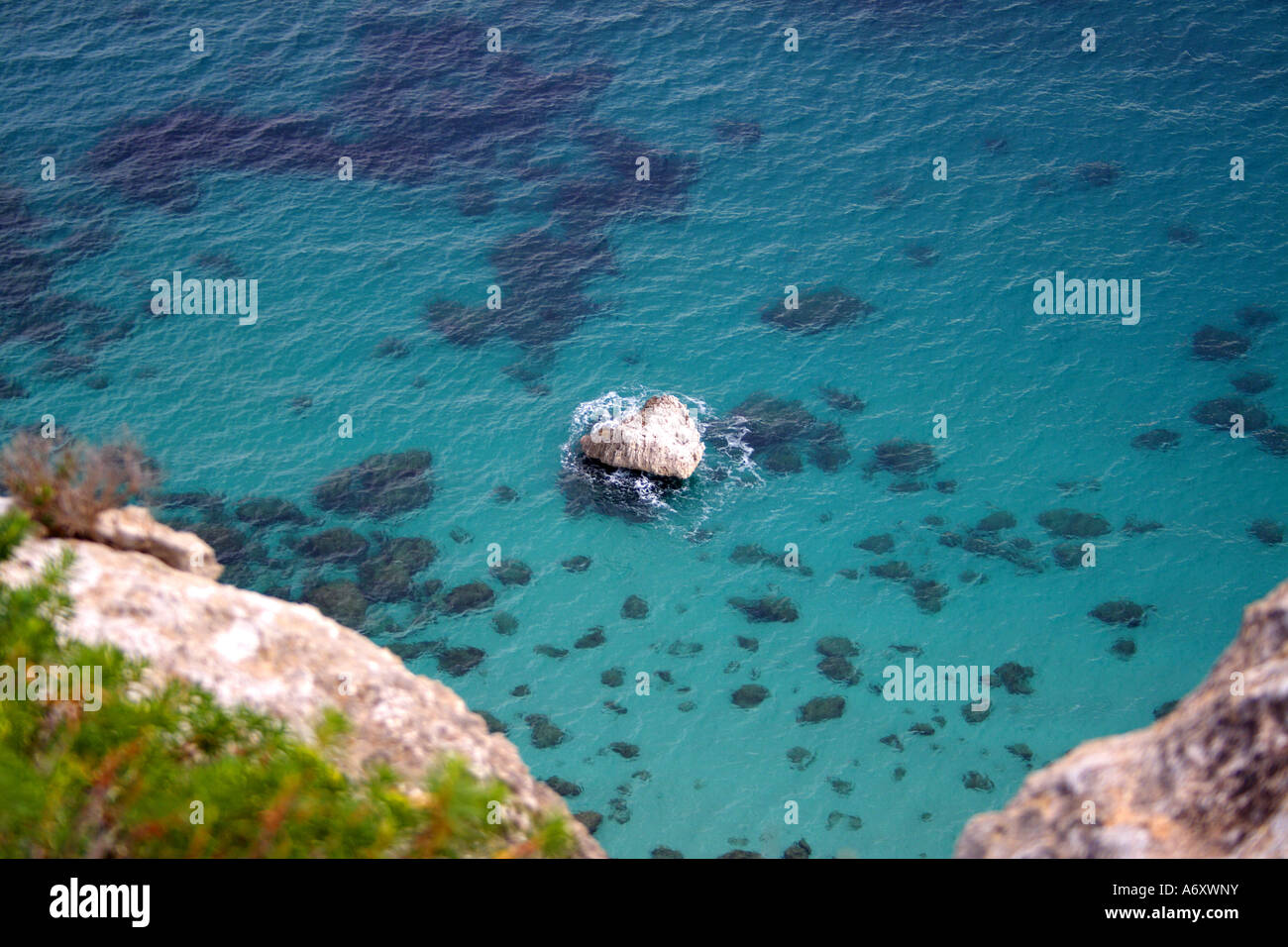 Rocks and transparent sea water - Cagliari, Sardinia, Italy Stock Photo ...
