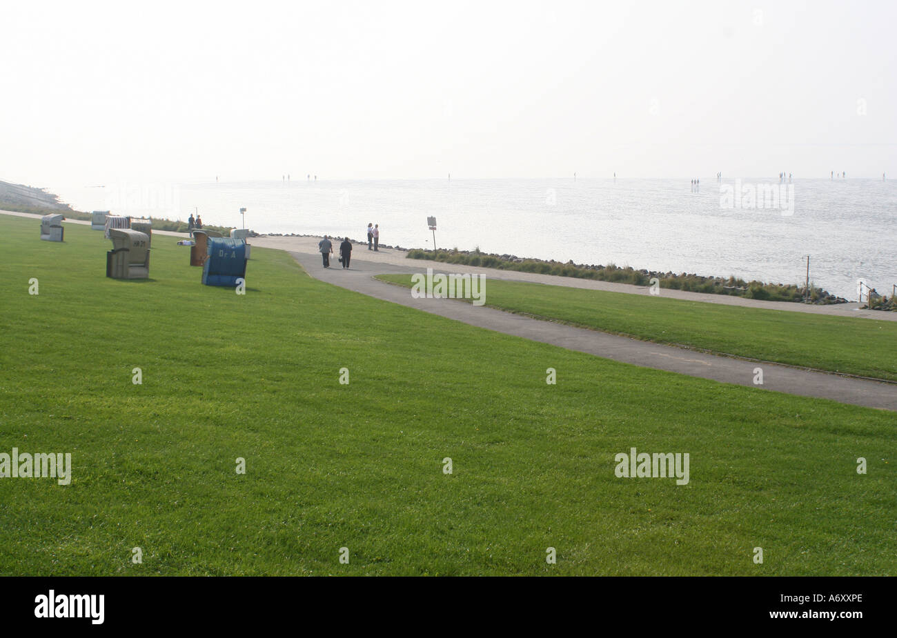 People walking on the bottom of the North Sea while low tide, in Buesum ...