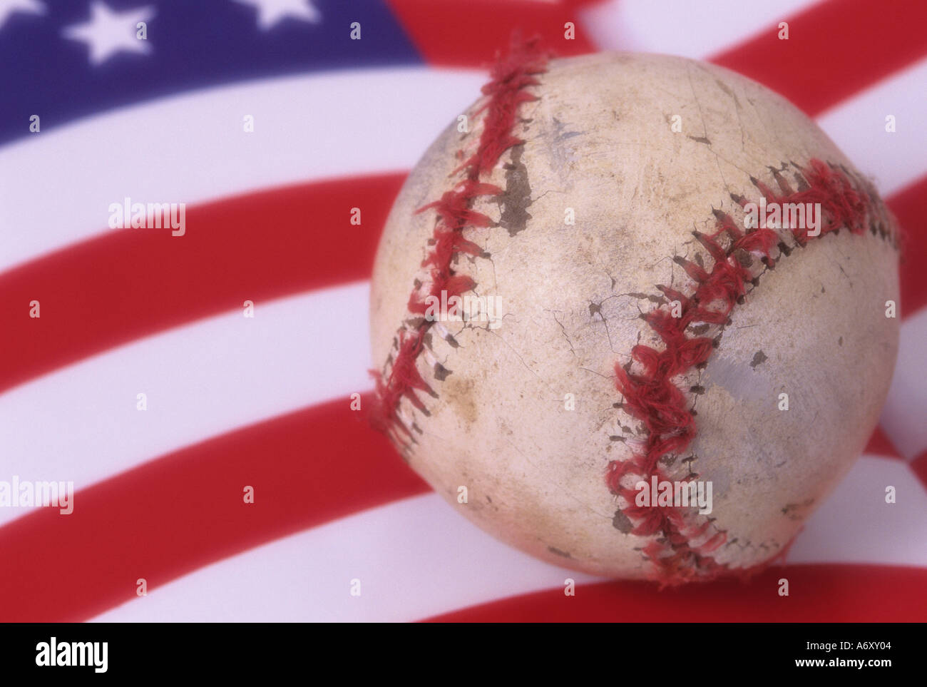 Old beat up baseball on an American flag Stock Photo - Alamy