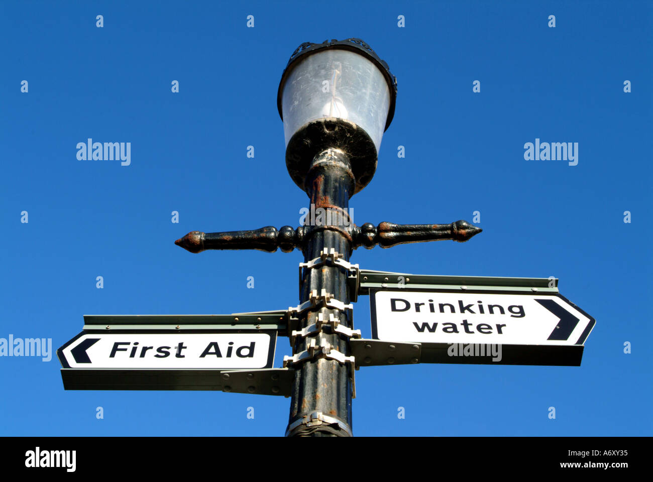 Lampost with signs on Ventnor beach Isle of Wight Stock Photo - Alamy