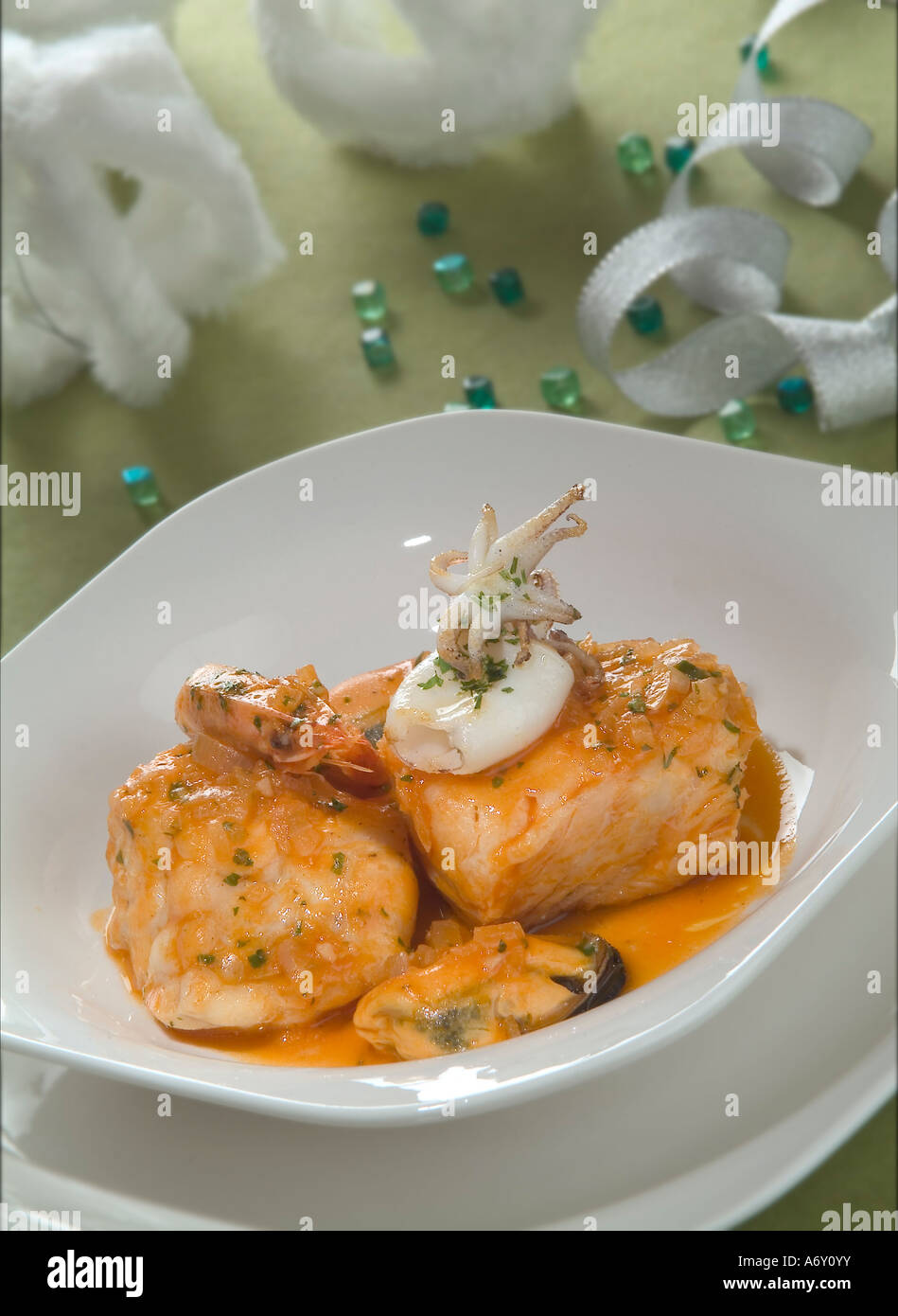Hake and seafood casserole Stock Photo - Alamy