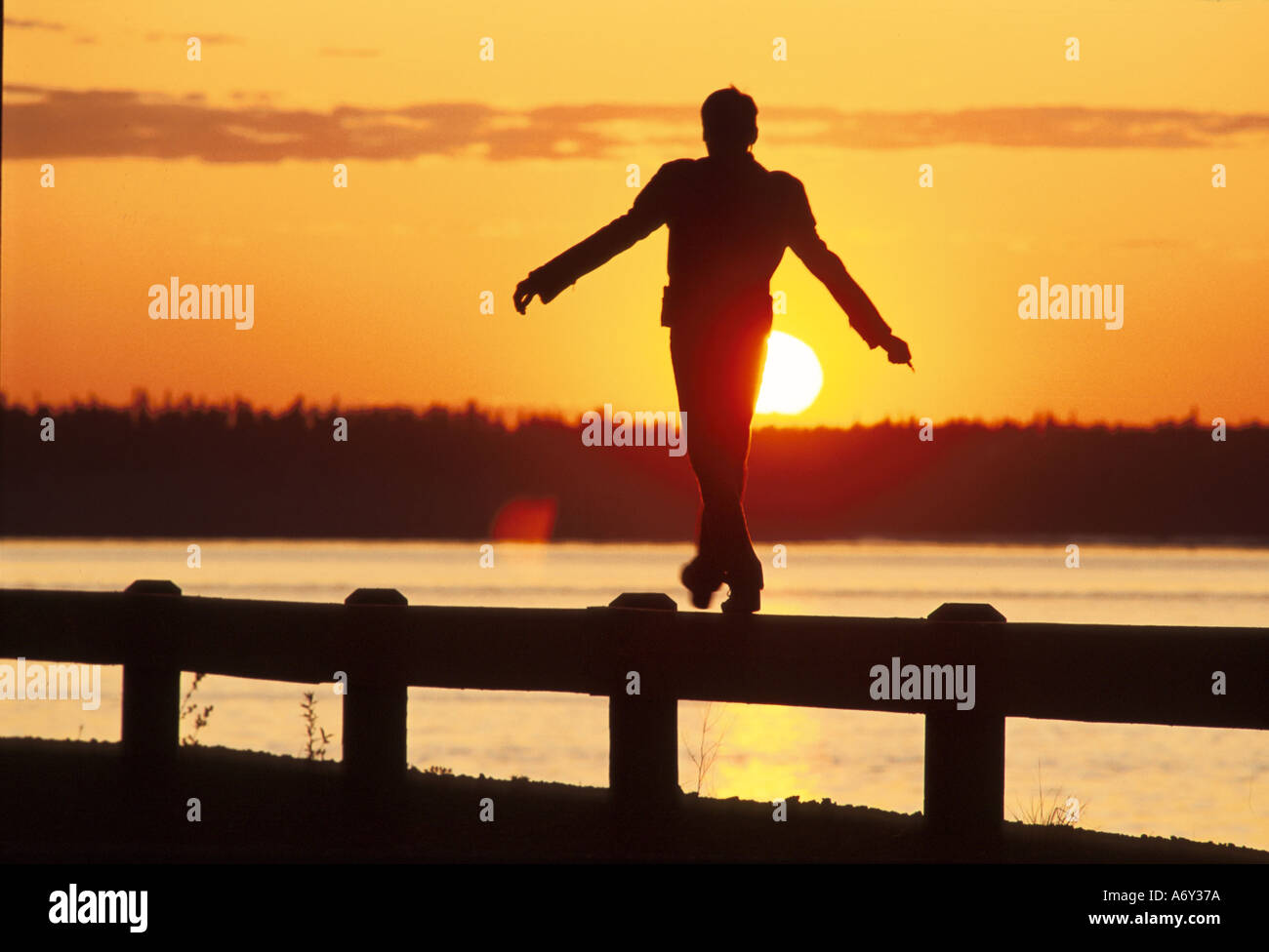 Silhouette railing sky sunset black color hi-res stock photography and ...