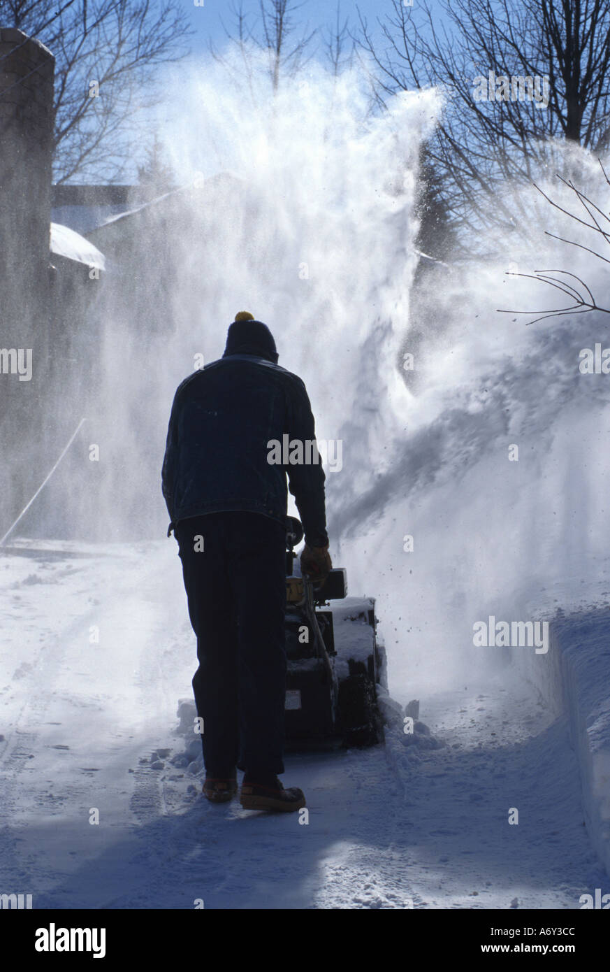 Minnesota Man Snowblowing Winter Storm Snow Buildings Tree Branches ...