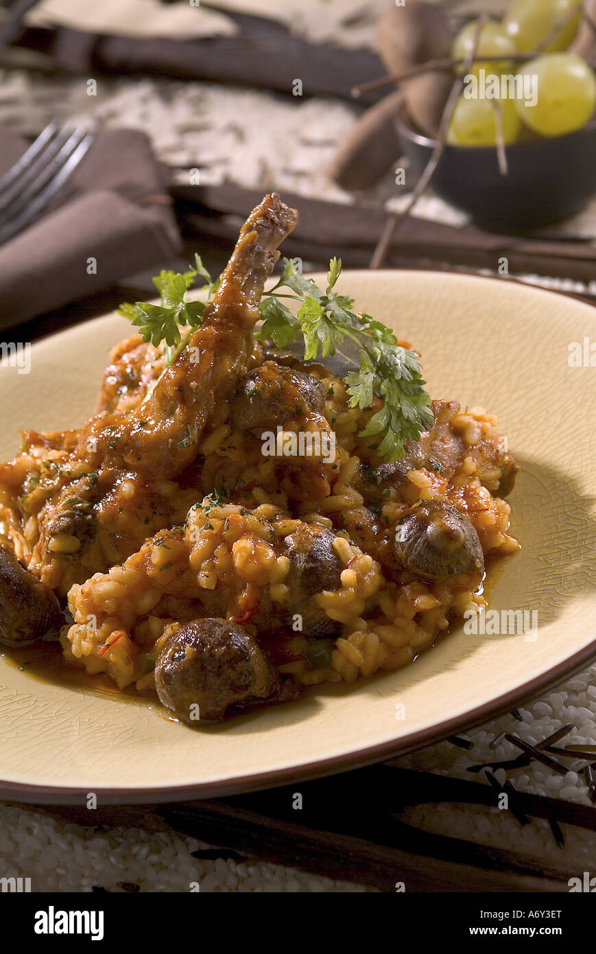 Rice with rabbit and snails Stock Photo - Alamy