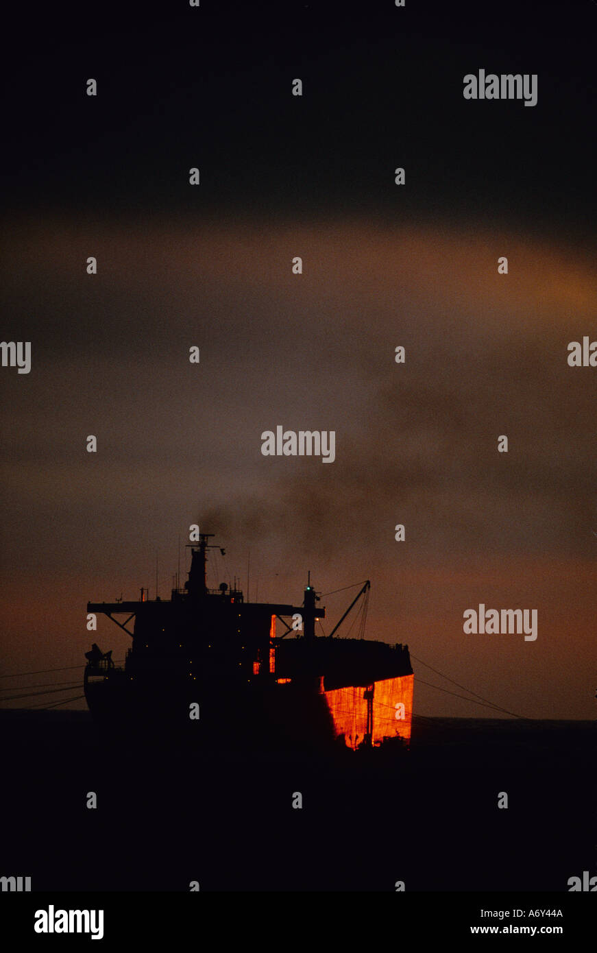 oil tanker ship at sunset Stock Photo - Alamy