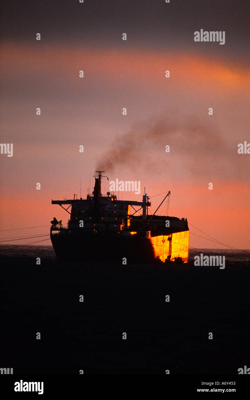 oil tanker ship at sunset Stock Photo - Alamy