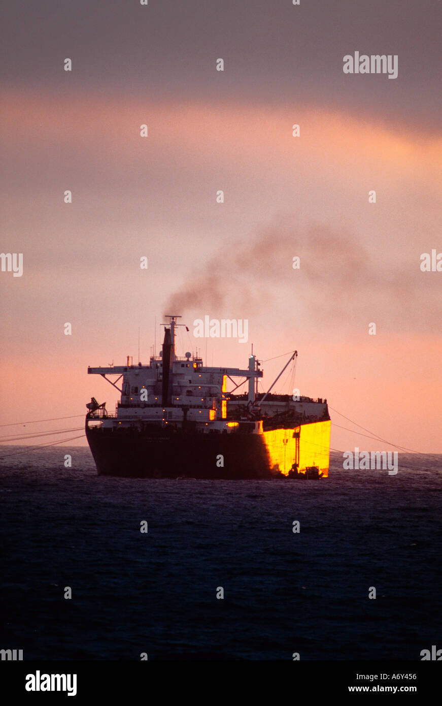 oil tanker ship at sunset Stock Photo - Alamy