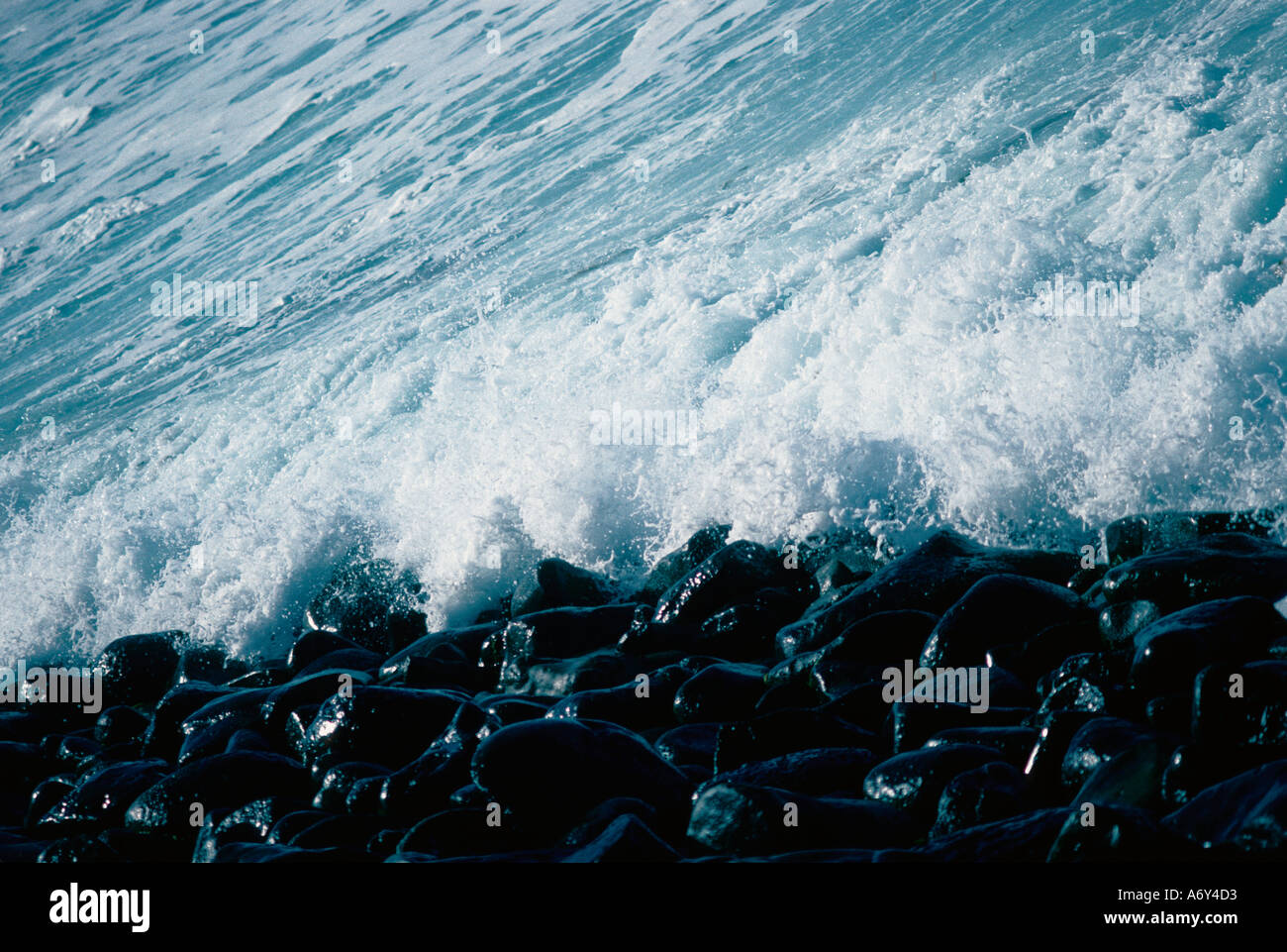 whitewash waves hitting rocks Stock Photo - Alamy