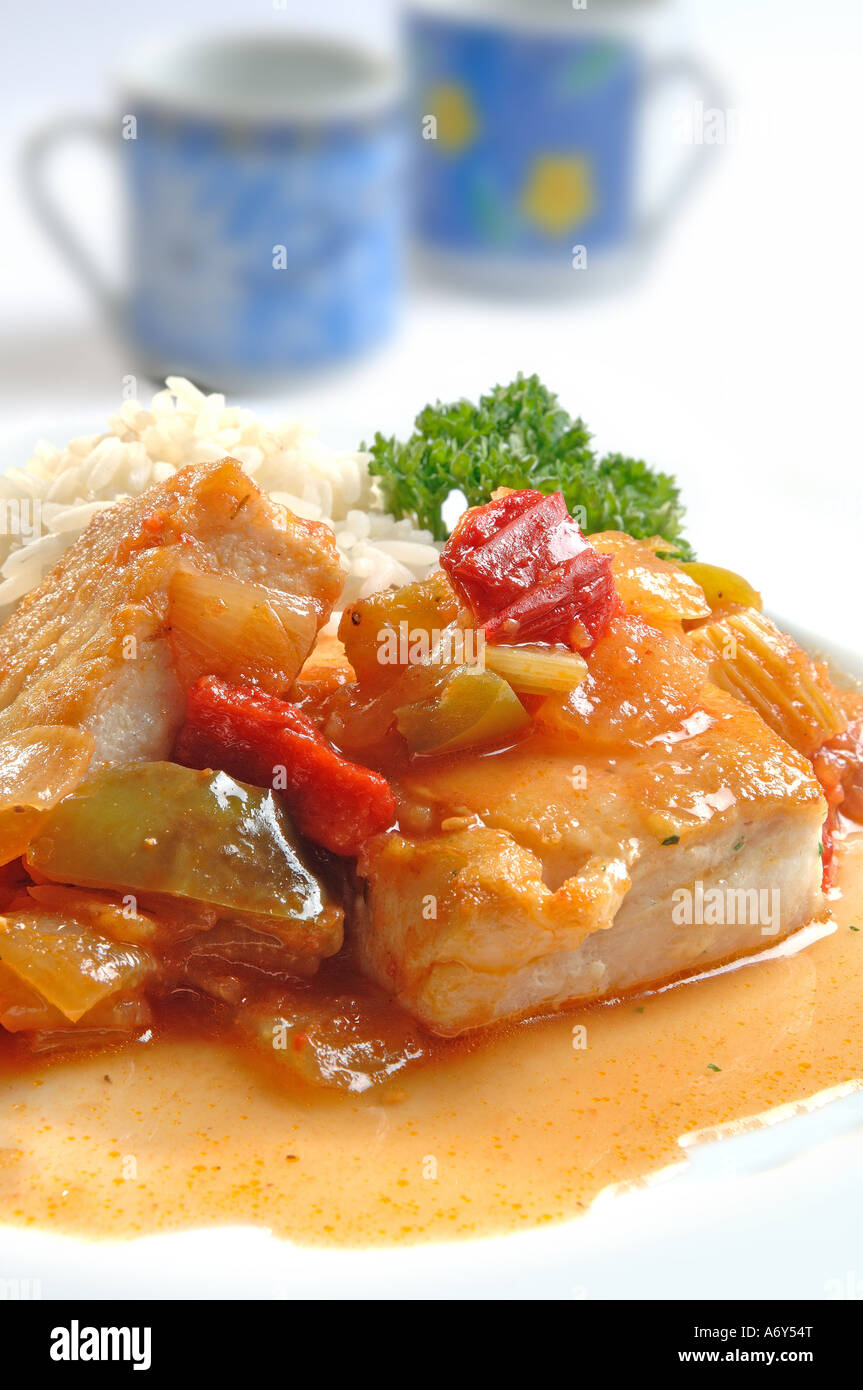 Grouper with creole sauce Stock Photo - Alamy