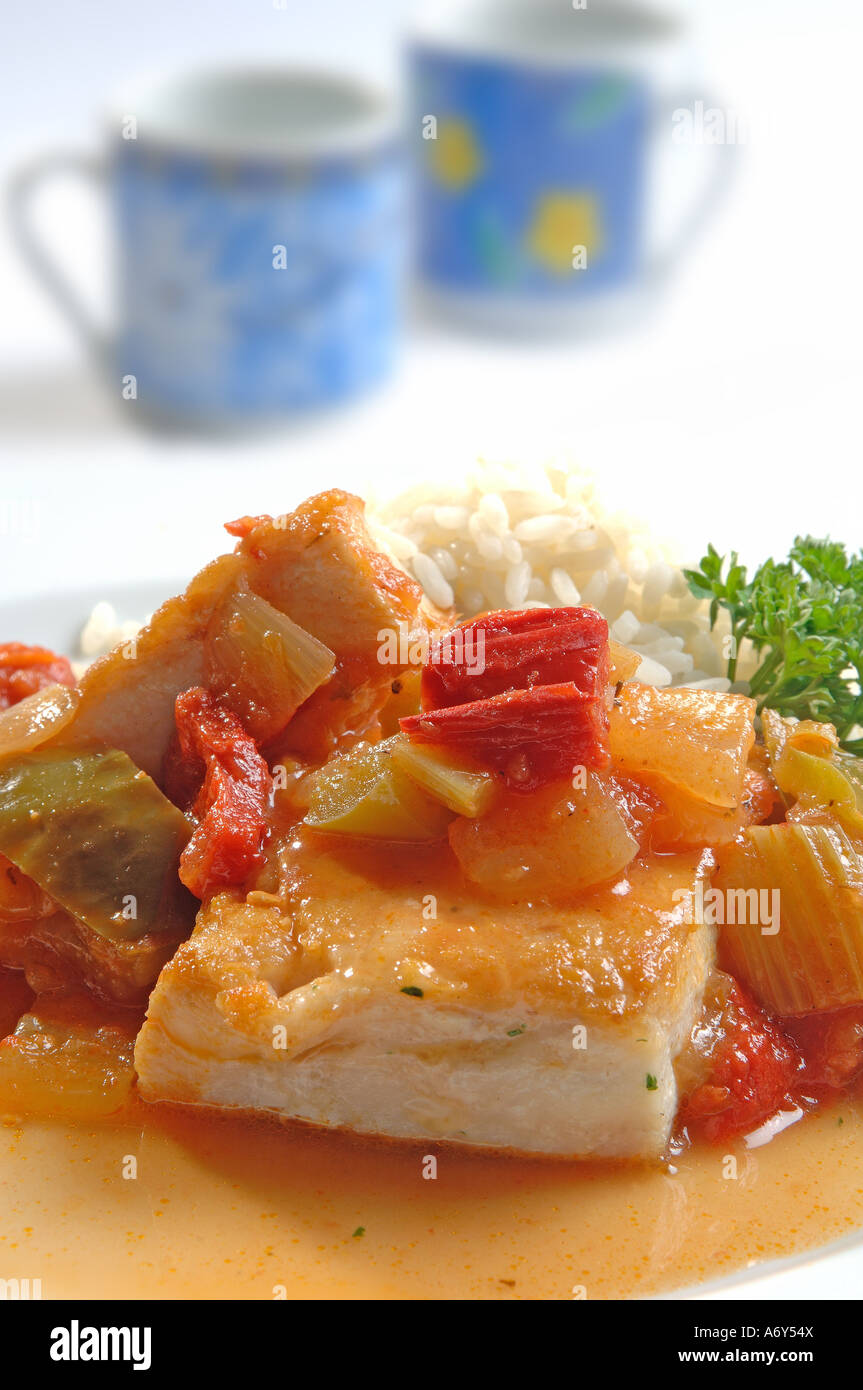 Grouper with creole sauce Stock Photo - Alamy