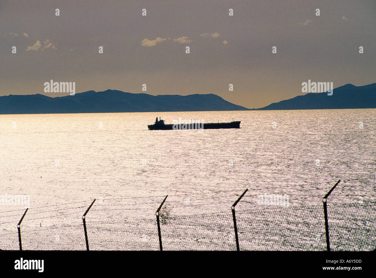 oil tanker ship at sunset Stock Photo - Alamy