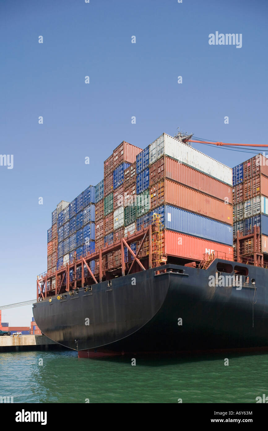 Cargo containers stacked on a ship Stock Photo - Alamy