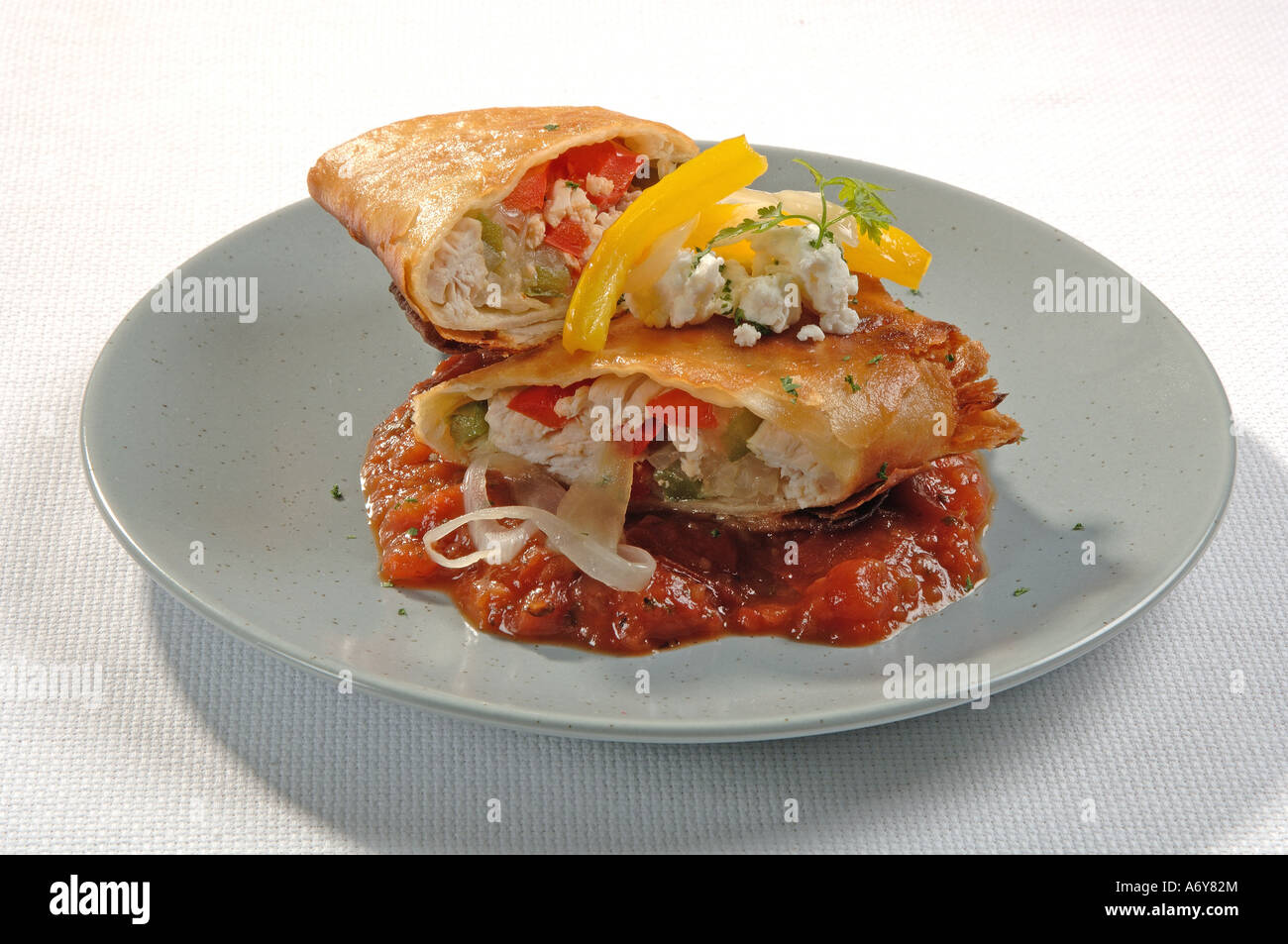 Fried corn rolls with chicken cheese and Mexican sauce Stock Photo - Alamy