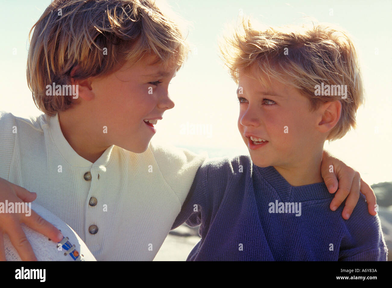 portrait of two boys talking Stock Photo - Alamy